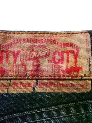 A BATHING APE Star-print Distressed Jeans