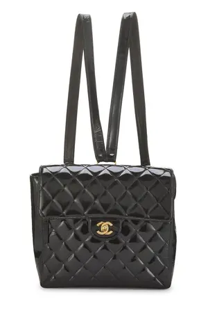 Chanel Gold Tone Backpacks