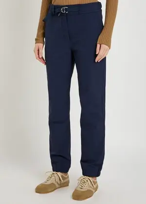 Moncler Logo-appliquéd Stretch-polyamide Trousers - Blue
