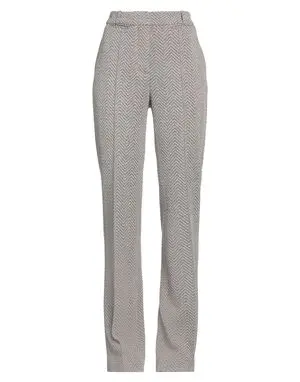 THE MANNEI Flared Herringbone Trousers