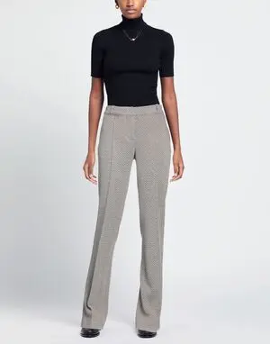 THE MANNEI Flared Herringbone Trousers