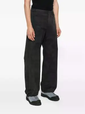 STAY HUMAN ON EARTH Camouflage-pattern Trousers
