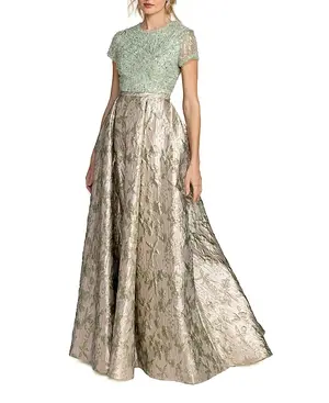Sheer Sleeve Beaded Ball Gowns