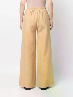 Rodebjer Wide-leg Jogger Trousers In Sand Beige
