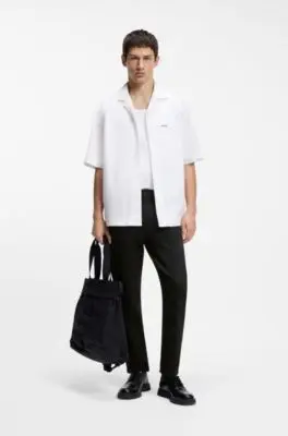 Hugo Tapered-fit Jeans In Thermo-regulating Denim