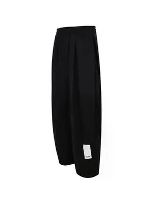 TEE LIBRARY Pleated Logo-patch Trousers