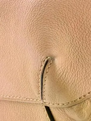 LOUIS VUITTON Bagatelle Monogram Empreinte Leather Hobo Bag - Neutrals