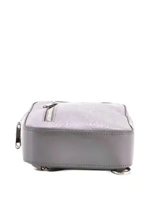 Gucci Sling Gg Embossed Perforated Leather Backpack