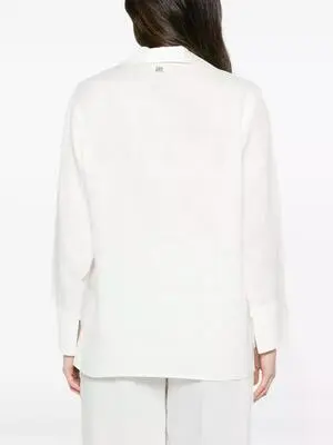 PANICALE Side-slit V-neck Blouse