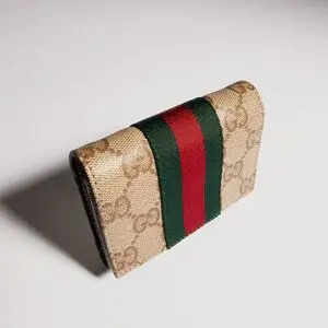 Gucci Bi-fold Card Case With Web Gg Canvas - Beige