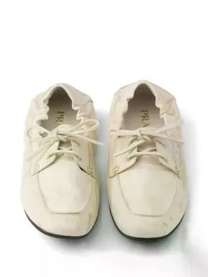 Prada Antiqued Leather Boat Shoes With Lettering Logo - Neutrals