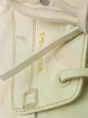 Prada Antiqued Leather Boat Shoes With Lettering Logo - Neutrals