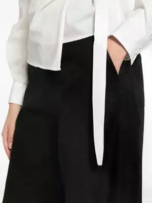 COVERT Wide-leg Trousers