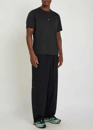 Satisfy Space-o Perforated Stretch-nylon Trousers - Black