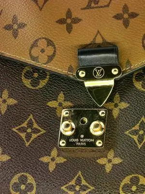 LOUIS VUITTON Pochette Metis Reverse Monogram Canvas - Brown