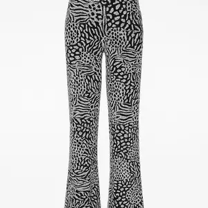 THE MOLC Sequined Flare Trousers