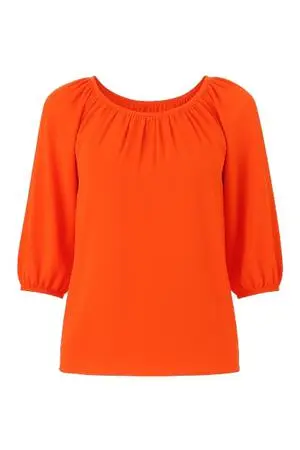 CONQUISTA Ruffle Neck Top