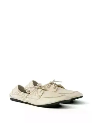 Prada Antiqued Leather Boat Shoes With Lettering Logo - Neutrals