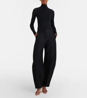 Alaïa Invisible Leather Wedge Thong Sandals