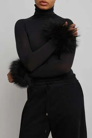 Alaïa Knitted Bodysuit With Fur Cuffs