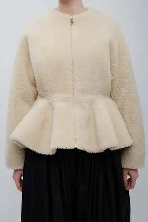 Alaïa Peplum Shearling Jacket