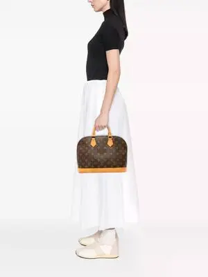 LOUIS VUITTON 1998 Monogram Alma Pm Handbag - Brown
