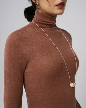JUANA Ossa Knitted Hemp Turtleneck