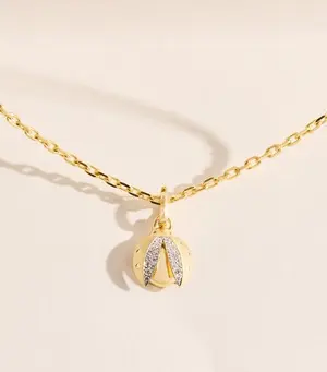 JADE TRAU 18kt Yellow And Diamond Mini Ladybug Charm