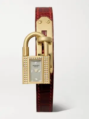 STEPHANIE WINDSOR Hermès 1995 18 Karat Diamond And Leather Padlock Watch - Gold