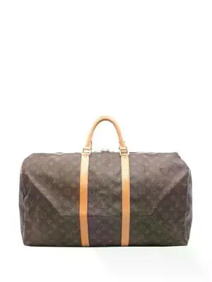 COACH Women's Signature Canvas Duffle Bags