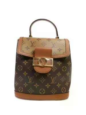 Louis Vuitton Gold Tone Backpacks