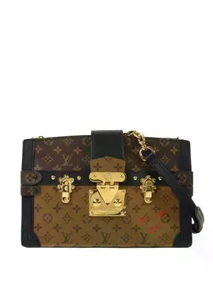 Louis Vuitton Gold Tone Clutches