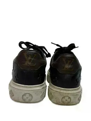 LOUIS VUITTON Leather Monogram Embossed Time Out Sneakers