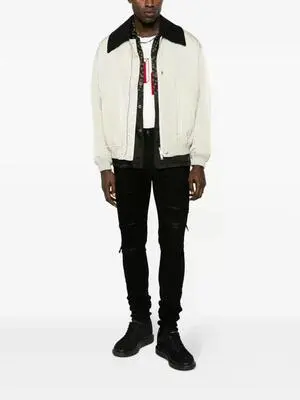 Amiri Cotton Blend Skinny Jeans With Distressed Details - Black