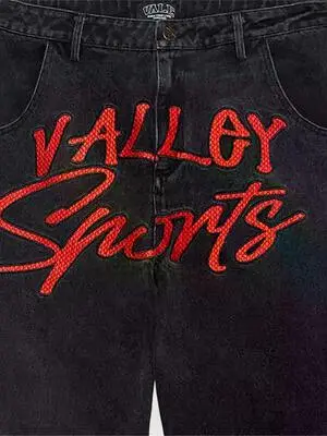 VALE FOREVER Symbol Embroidered Jeans