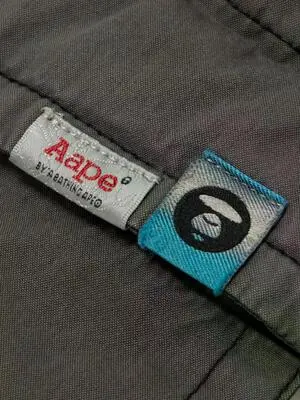 AAPE BY *A BATHING APE Moonface Logo Patch Relaxed Trousers