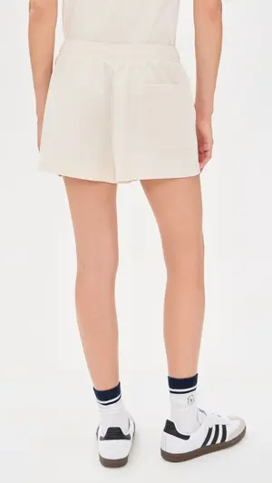 SPORTY & RICH Varsity Crest Disco Shorts - Ecru