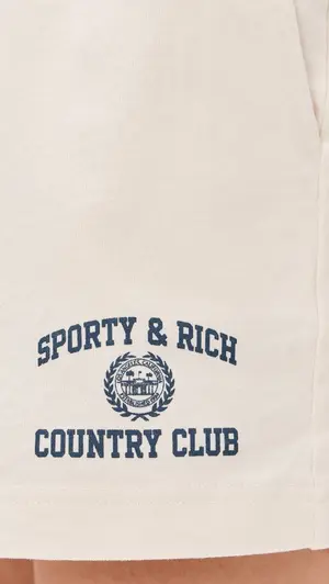 SPORTY & RICH Varsity Crest Disco Shorts - Ecru