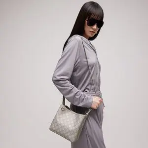Gucci Gg Emblem Small Bucket Bag In Monogram Coated Fabric - Grey
