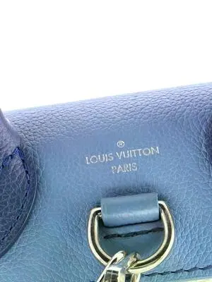 LOUIS VUITTON Lockme Leather Mini Backpack