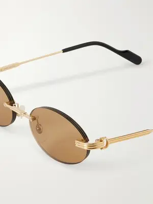 Cartier Rimless Oval Metal Sunglasses - Metallic