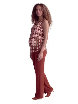 24SEVEN COMFORT APPAREL Maternity Geometric Print V-neck Top And Flared Pant Set