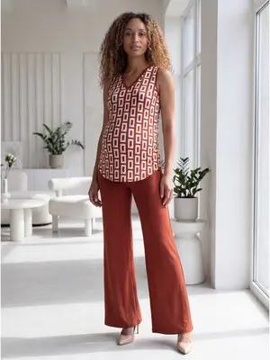 24SEVEN COMFORT APPAREL Maternity Geometric Print V-neck Top And Flared Pant Set