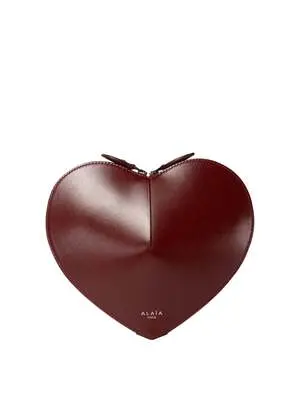 Alaia Cut Out Cross Body Bags