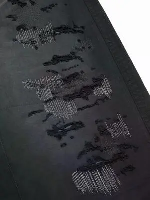 Acne Studios Mended Distressed Trousers