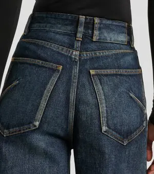 Alaïa Wide-leg Faded Jeans