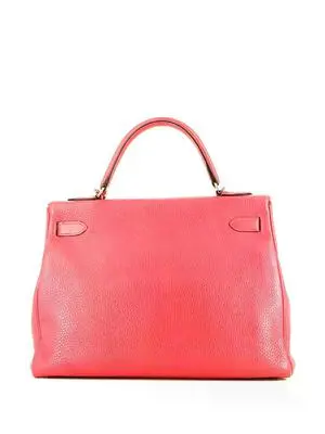 Hermès Kelly 32 Retourne Handbag In Salmon Togo Leather - Pink