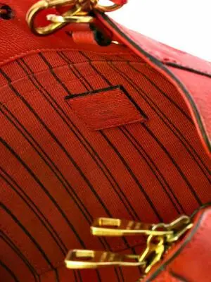 LOUIS VUITTON Montaigne Handbag Monogram Empreinte Leather Mm Satchel - Red