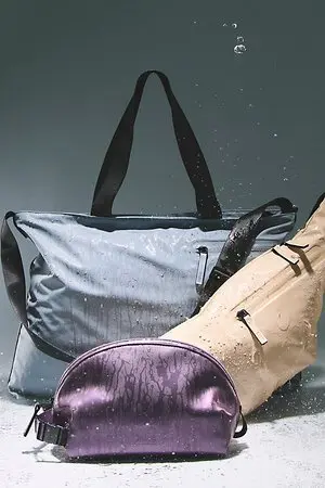 Rains Silver Tone Bags For Women