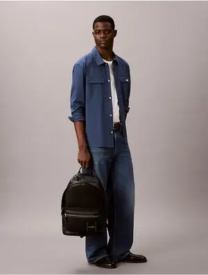 Calvin Klein Textured Pebble Round Backpack